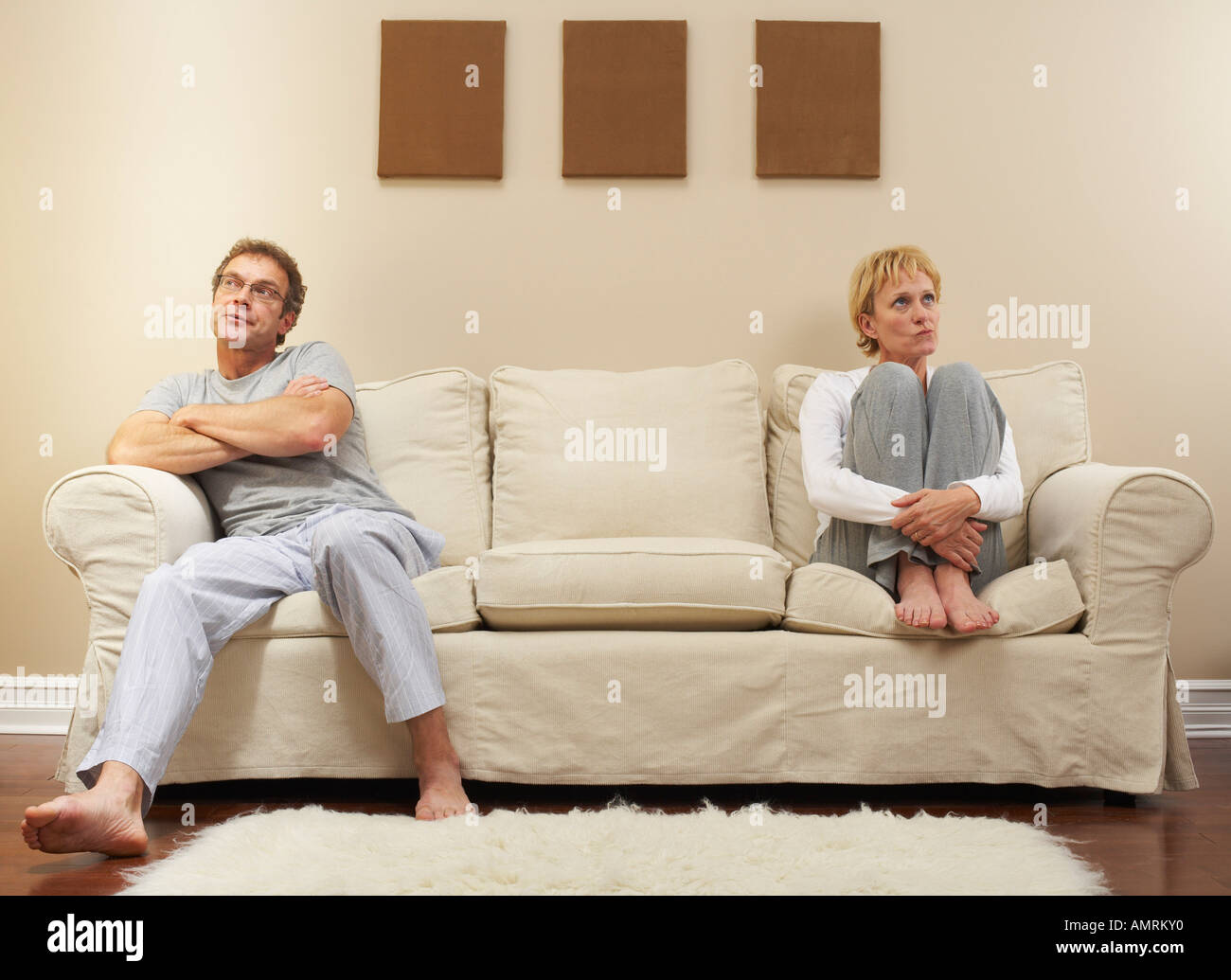 Grumpy couple with baby hi-res stock photography and images - Alamy