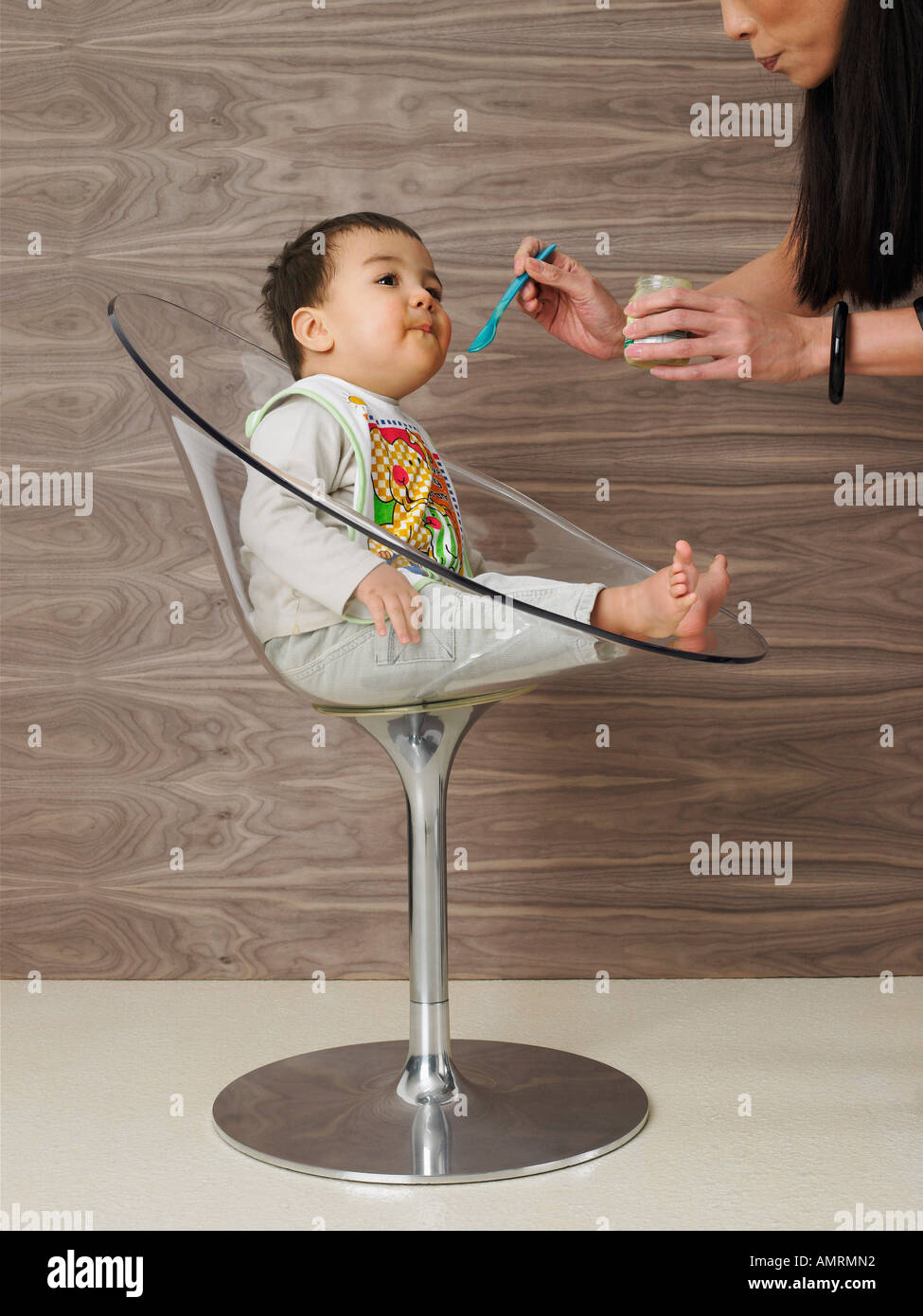 Mother Feeding Baby Stock Photo - Alamy