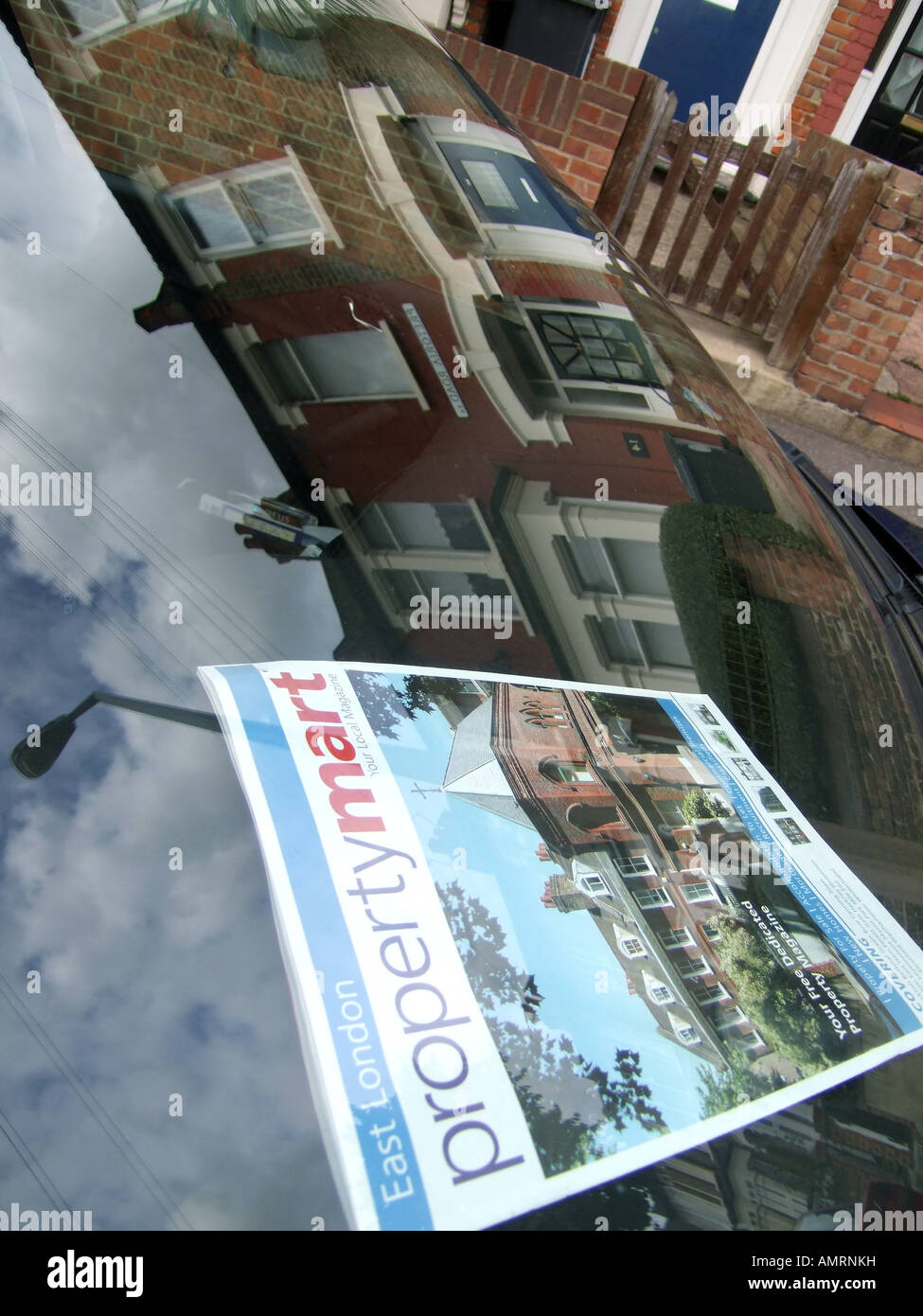 house hunting using the property press Stock Photo - Alamy