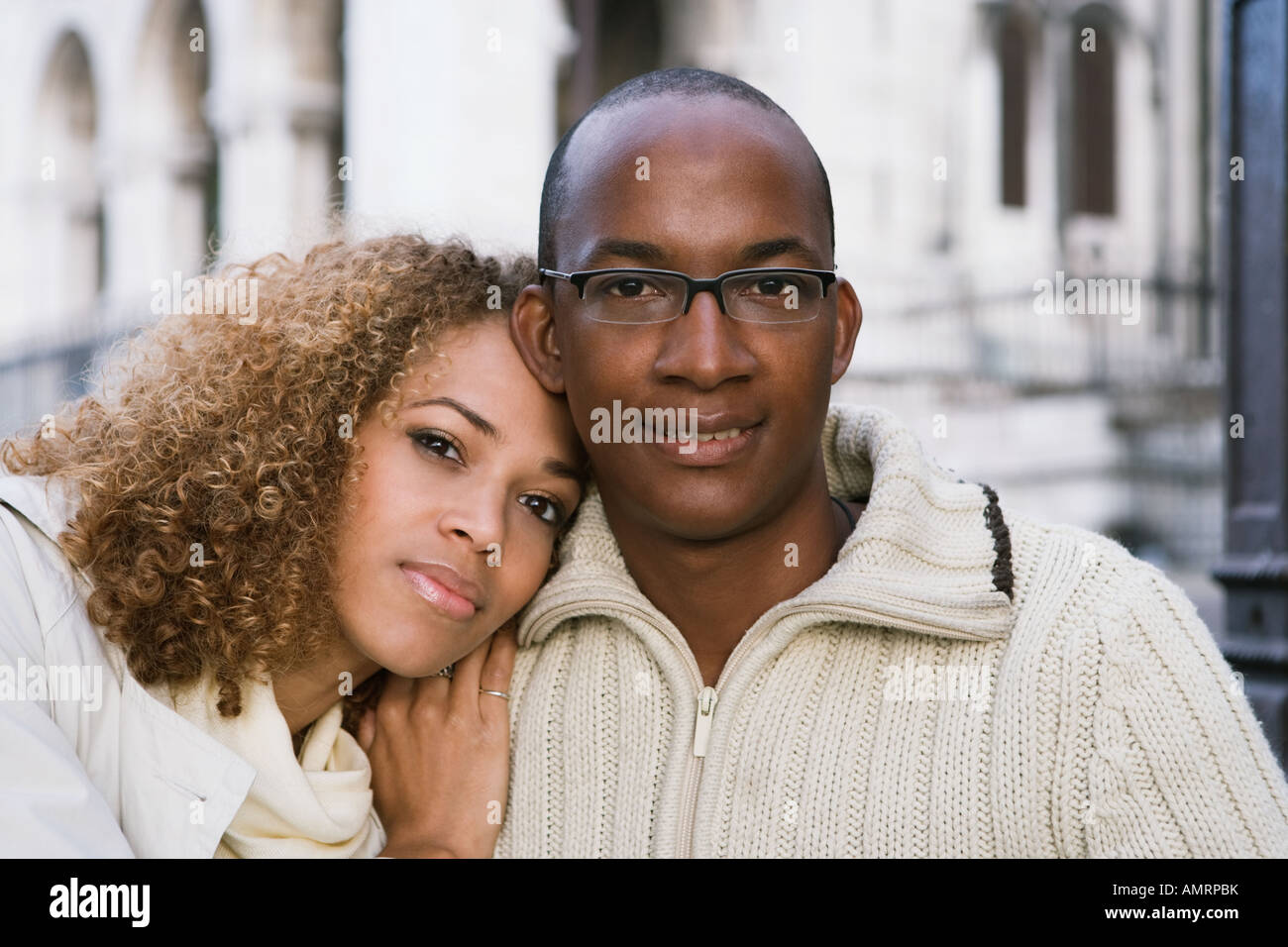 African couple hugging Stock Photo - Alamy
