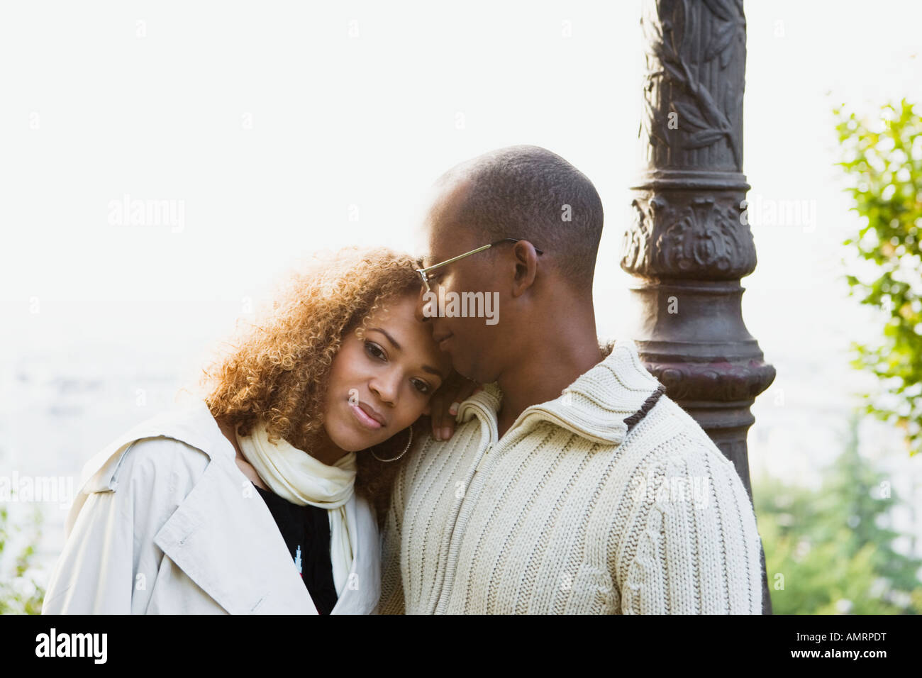 African couple hugging Stock Photo - Alamy