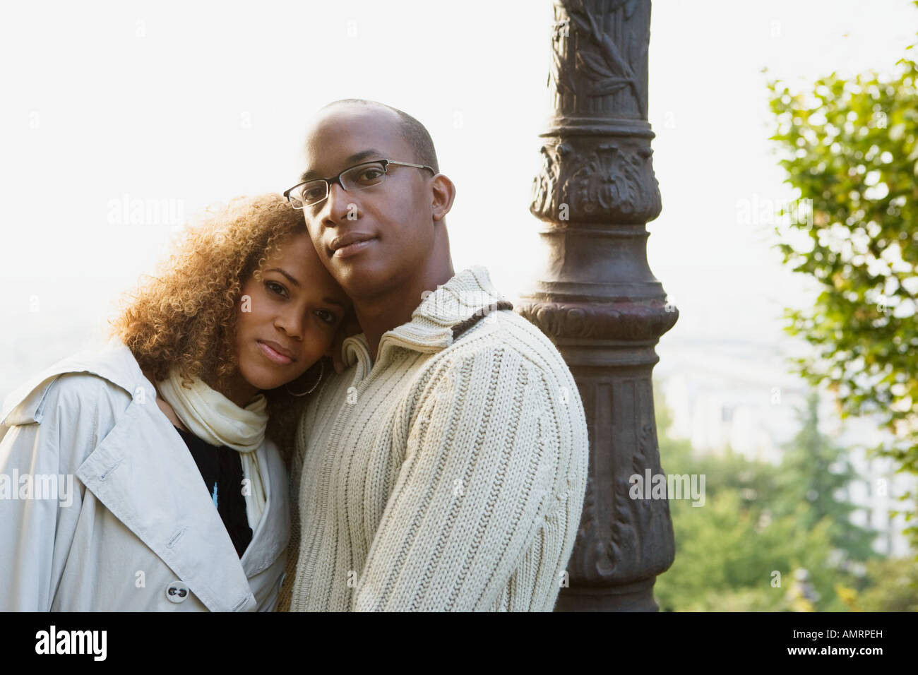 African couple hugging Stock Photo - Alamy