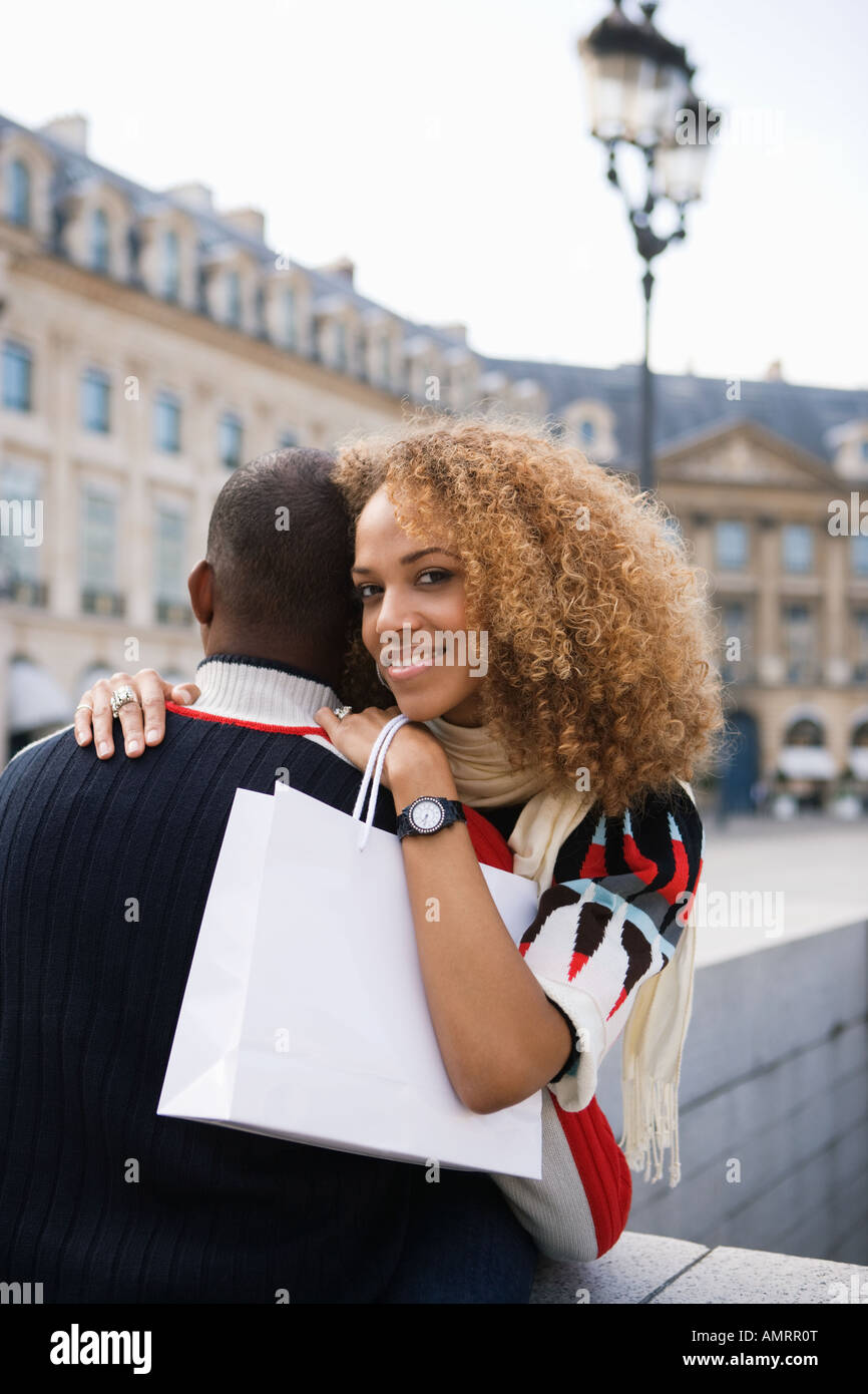 African couple hugging Stock Photo - Alamy