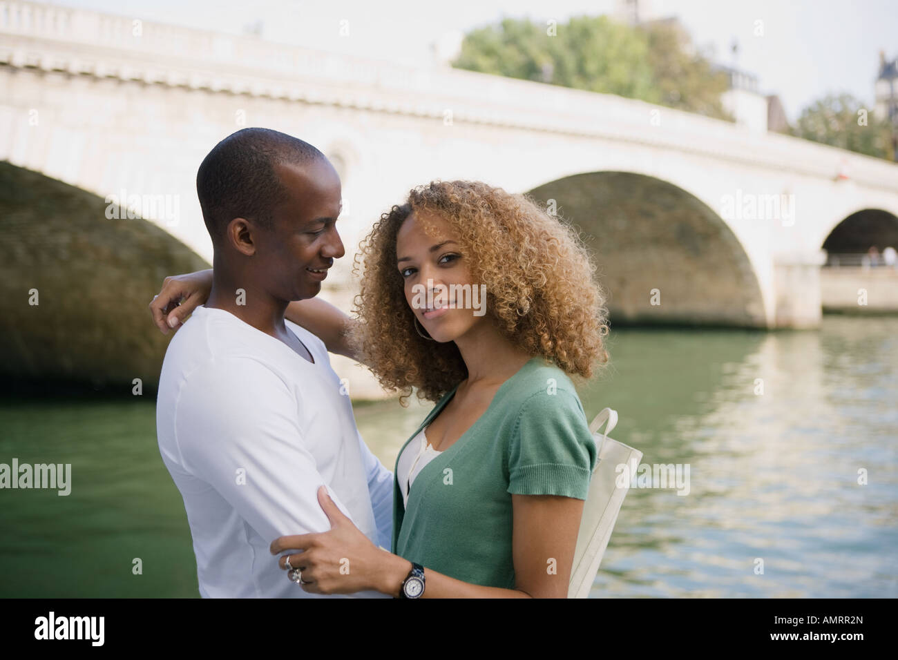 African couple hugging Stock Photo - Alamy