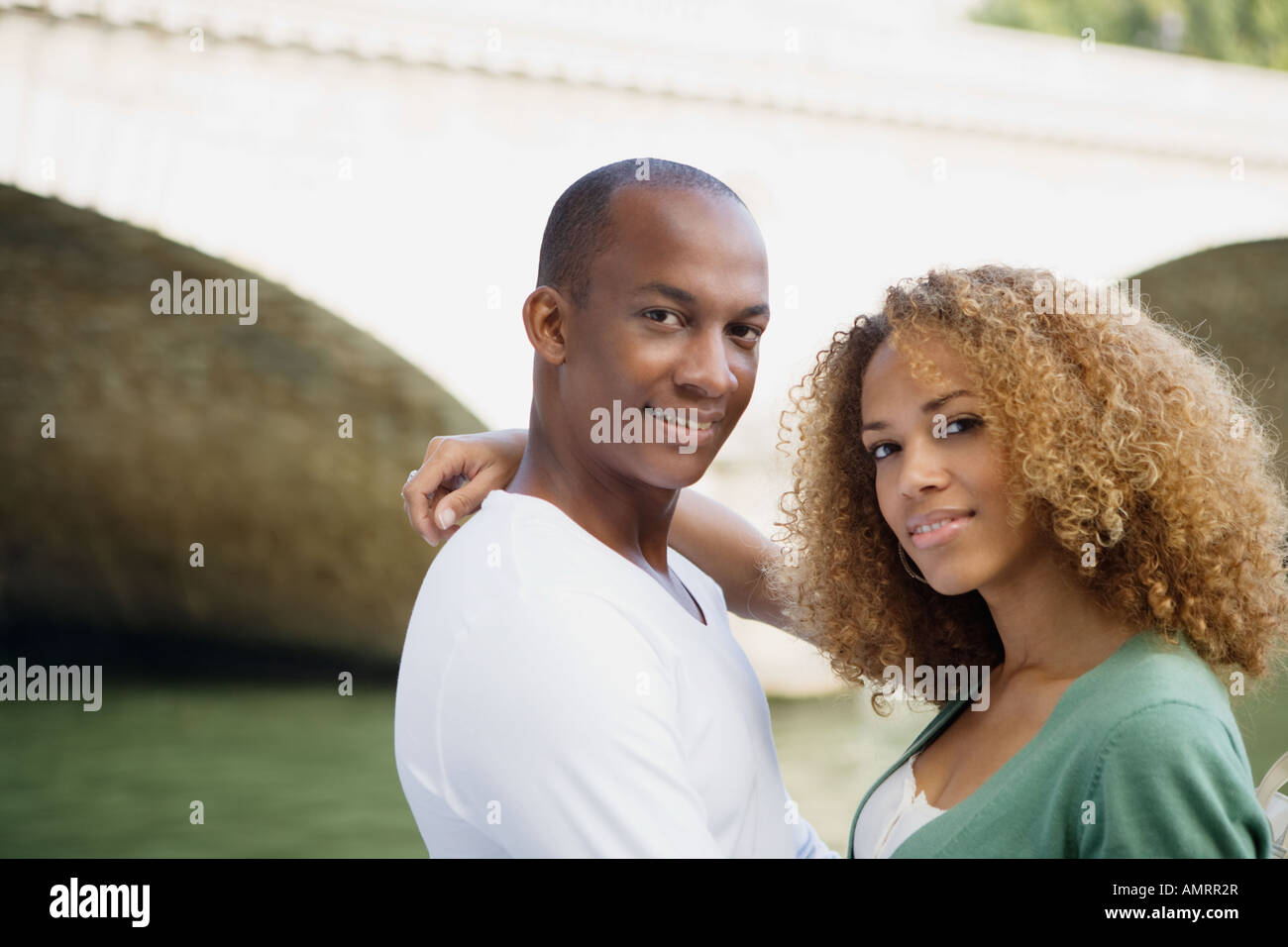 African couple hugging Stock Photo - Alamy
