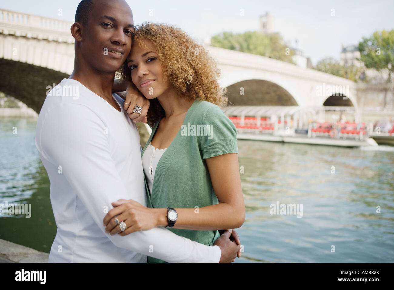 African couple hugging Stock Photo - Alamy