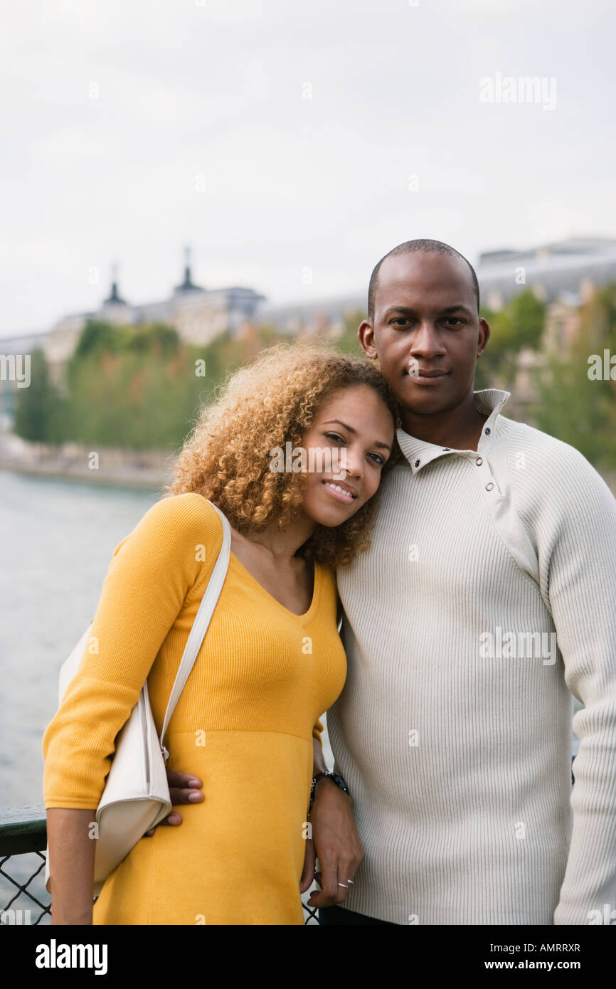 African couple hugging Stock Photo - Alamy