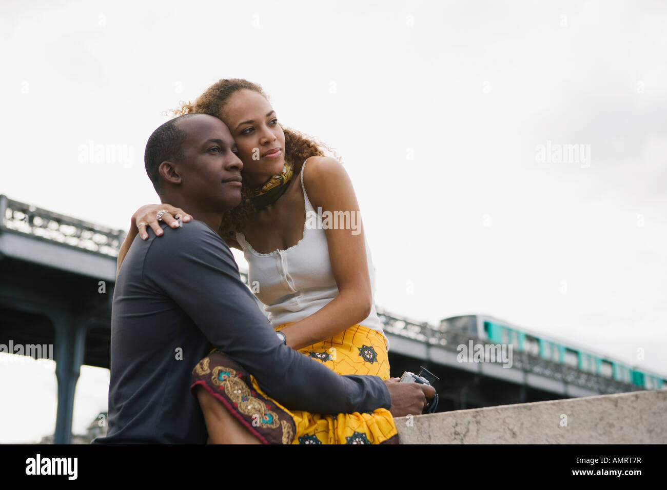 African couple hugging Stock Photo - Alamy