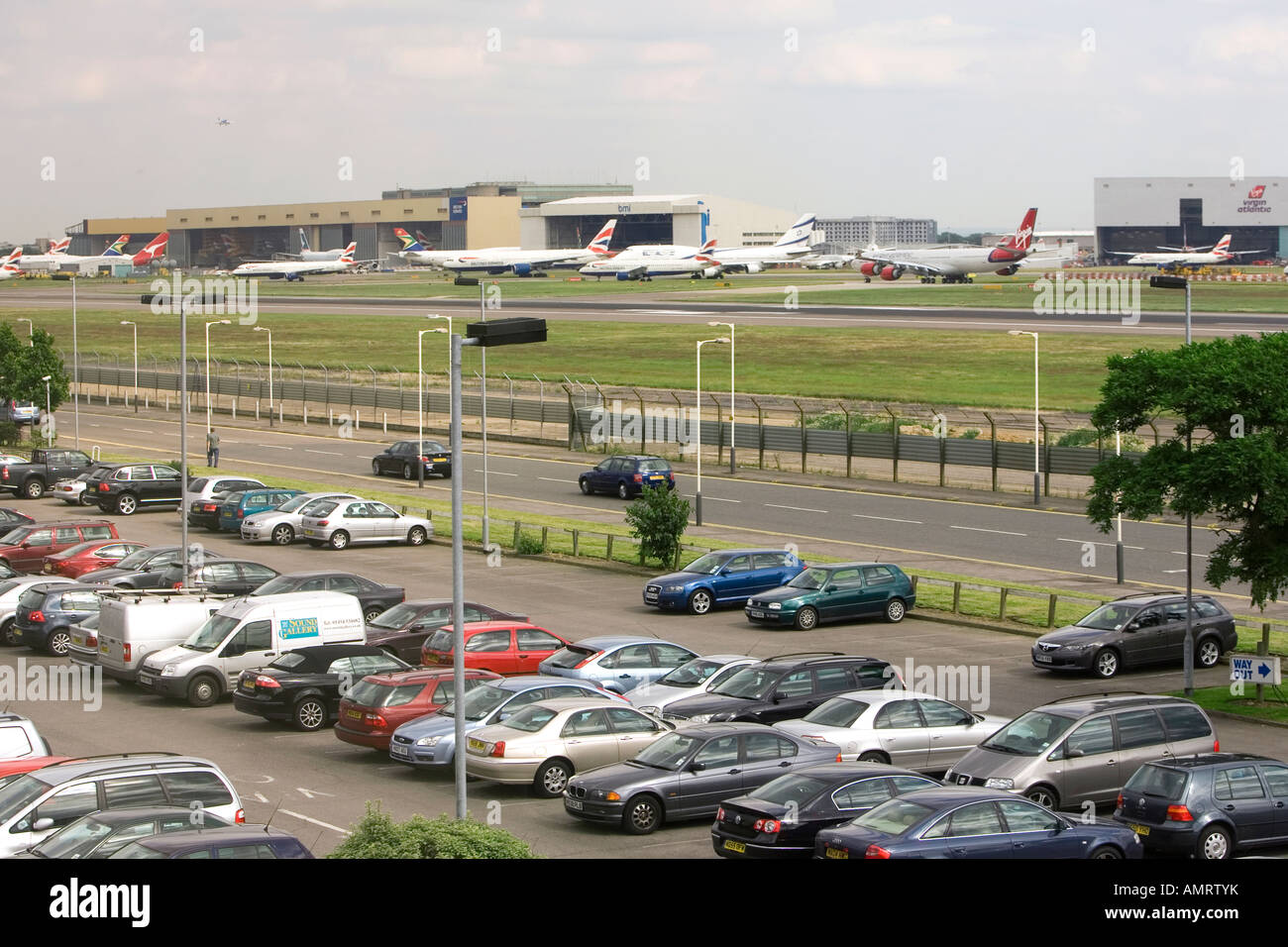 Lots of aeroplanes and parked cars at London Heathrow airport LHR Stock ...