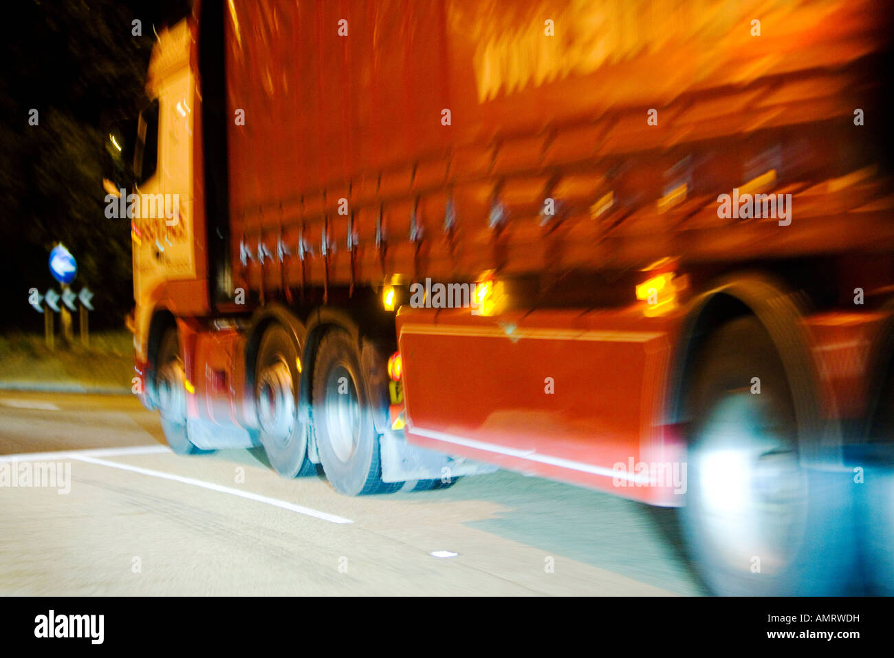 HGV on Motorway at Night Time Stock Photo - Alamy