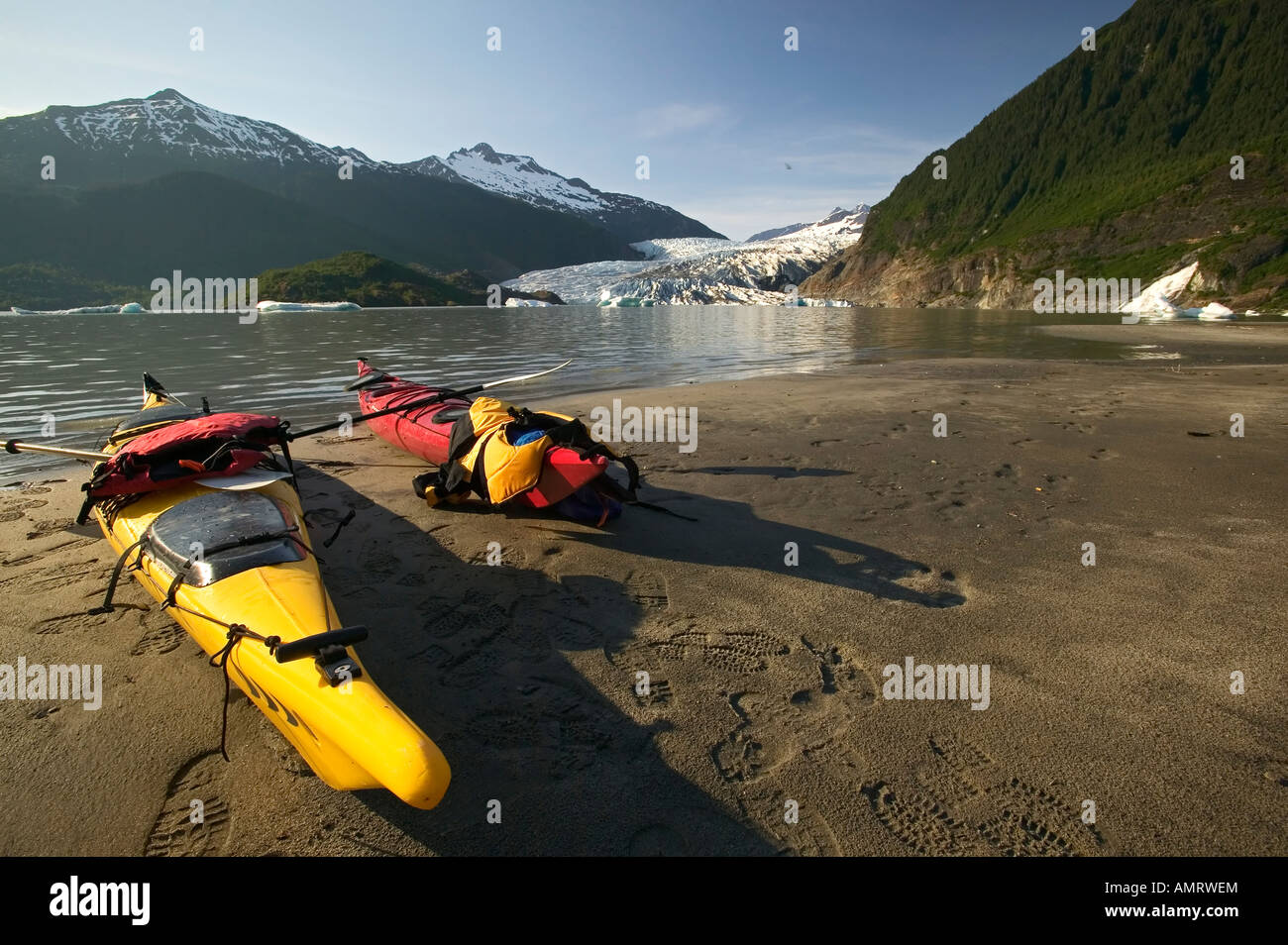 USA, Alaska, Inside Passage, Juneau, Kayaks near Mendenhall Lake with ...