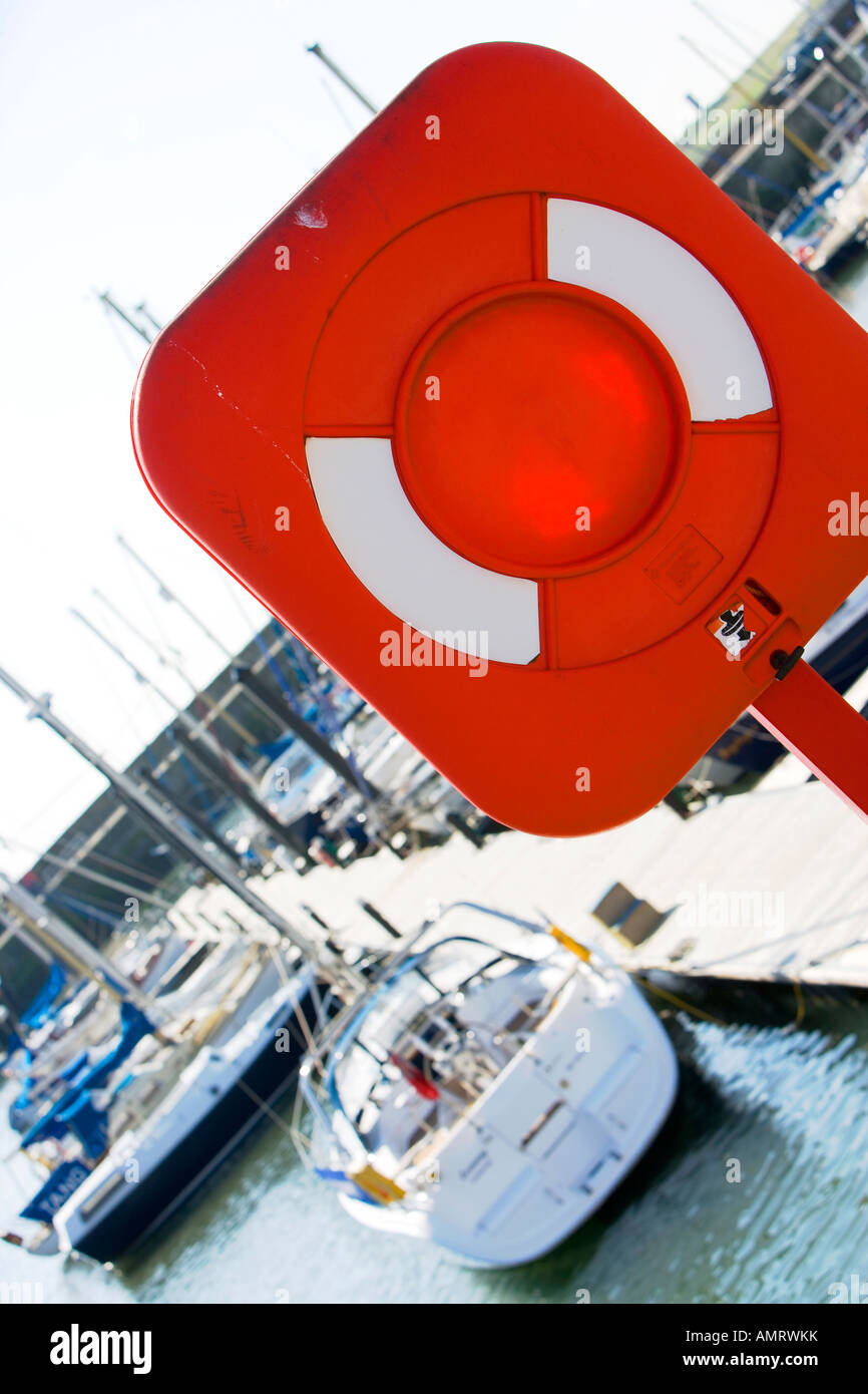 Lifebuoy at a harbour Stock Photo - Alamy