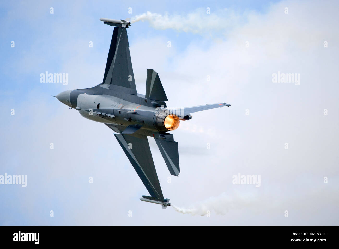 F16 blasting off with huge afterburner and contrails Stock Photo - Alamy