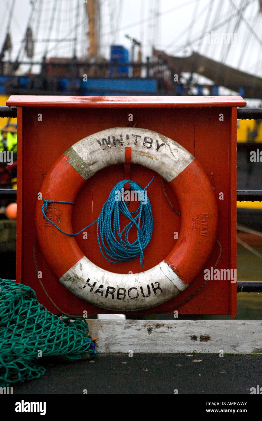 Lifebuoy at a harbour Stock Photo - Alamy
