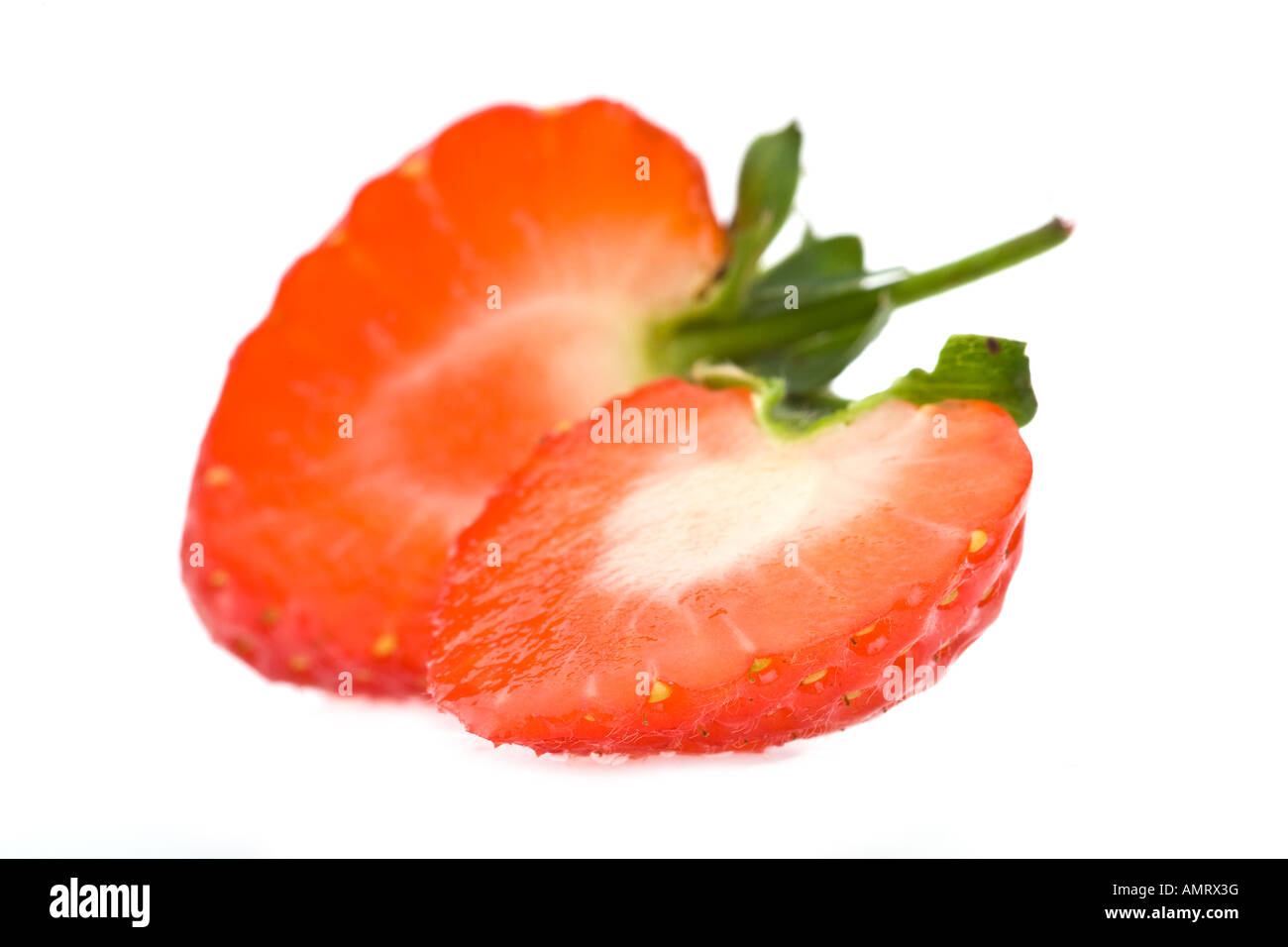 Strawberry cut in half Stock Photo - Alamy