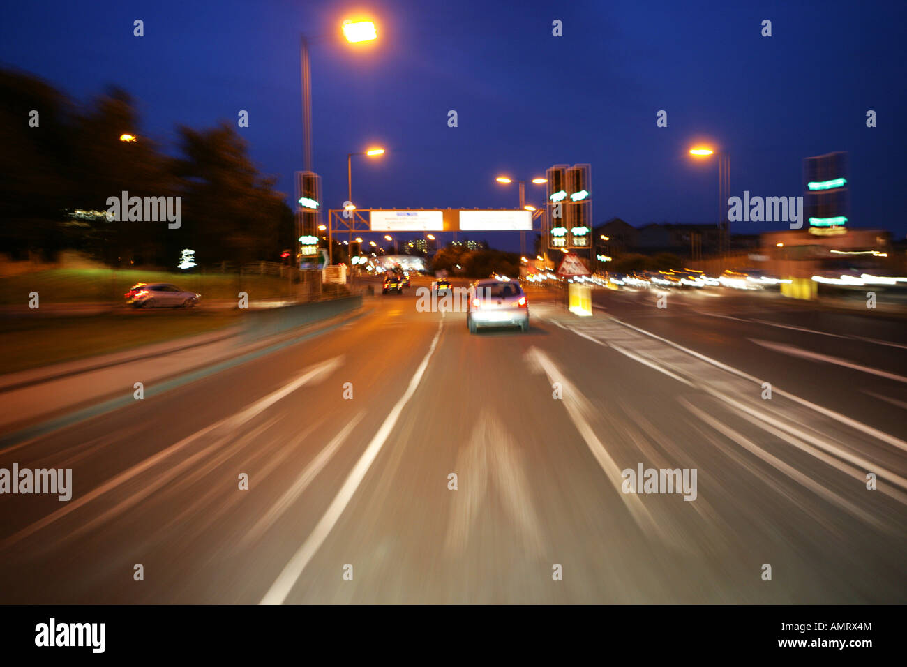 Traffic and cars at night on motorway in England Stock Photo - Alamy