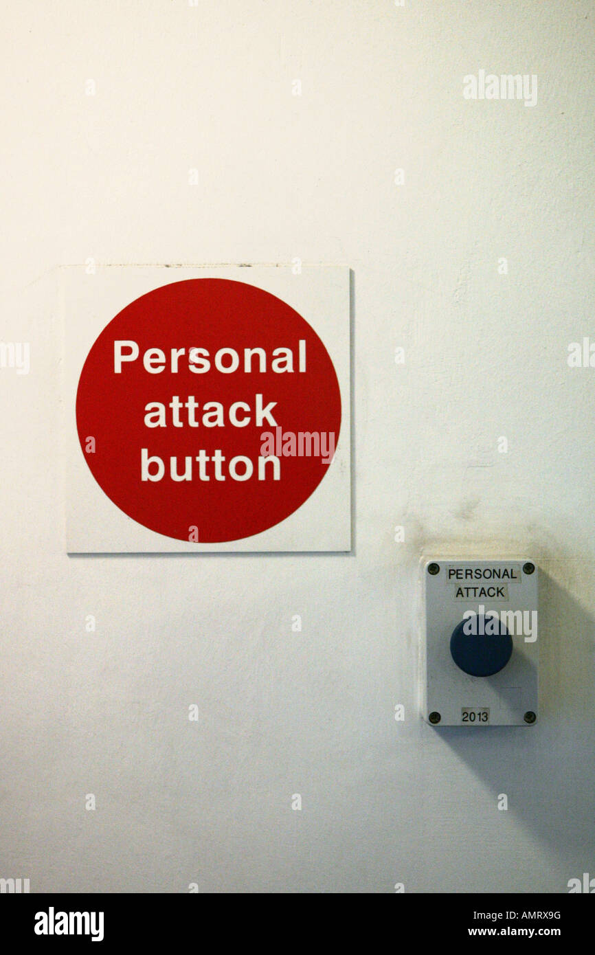Personal Attack button Stock Photo - Alamy