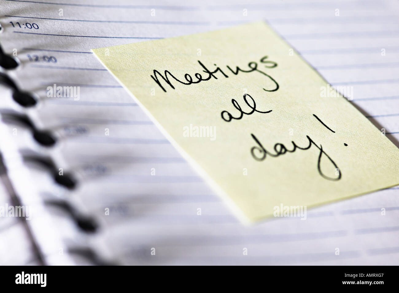 Sticky Note on Day Timer Stock Photo - Alamy
