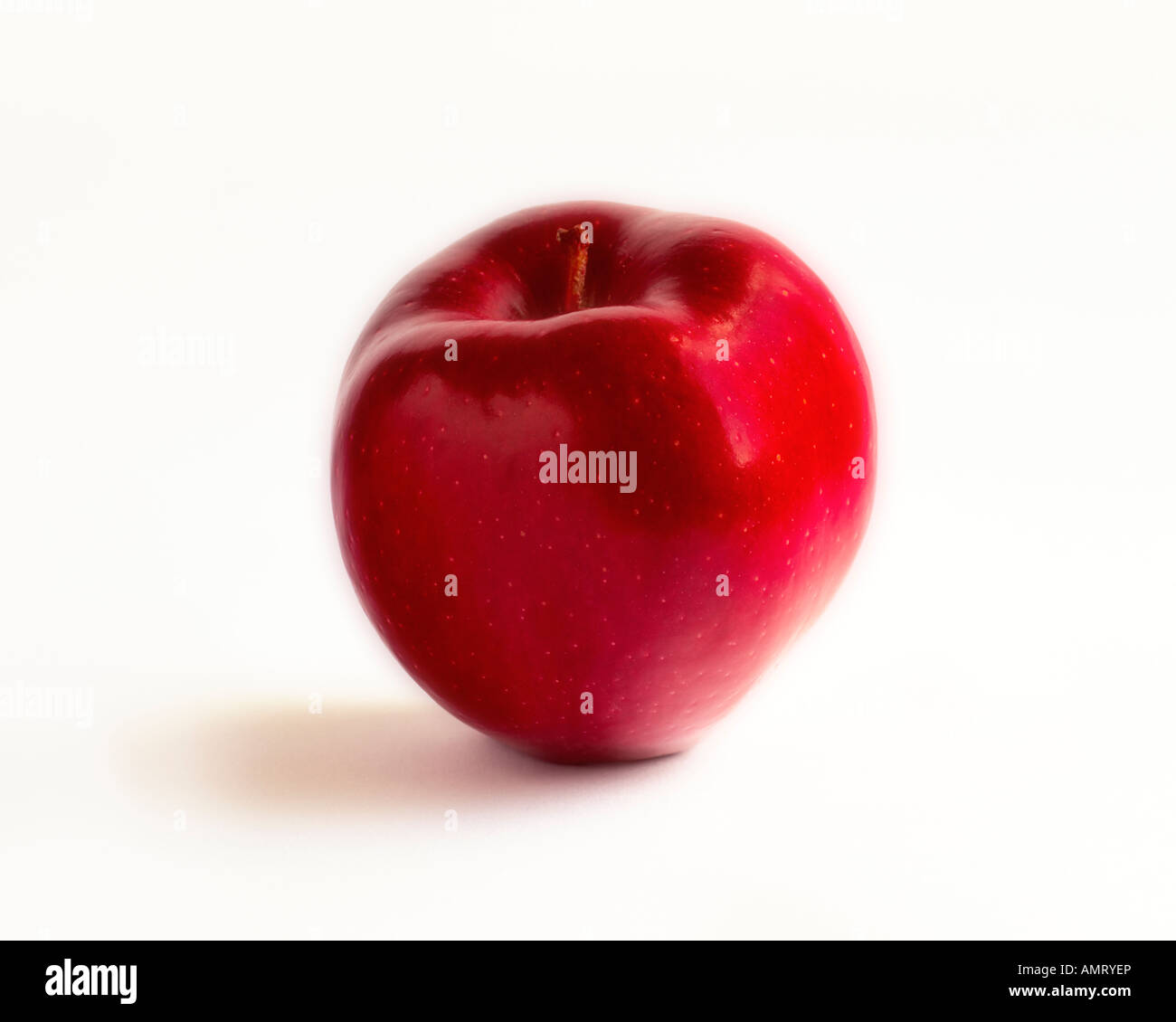Bright red apple on a white background Stock Photo - Alamy