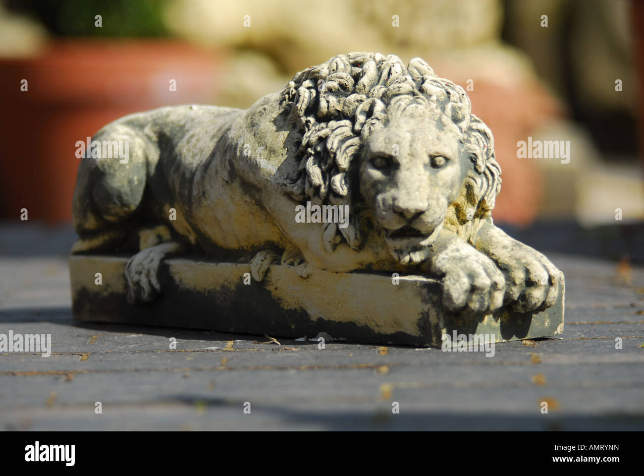 Carved stone statue of lion Stock Photo - Alamy