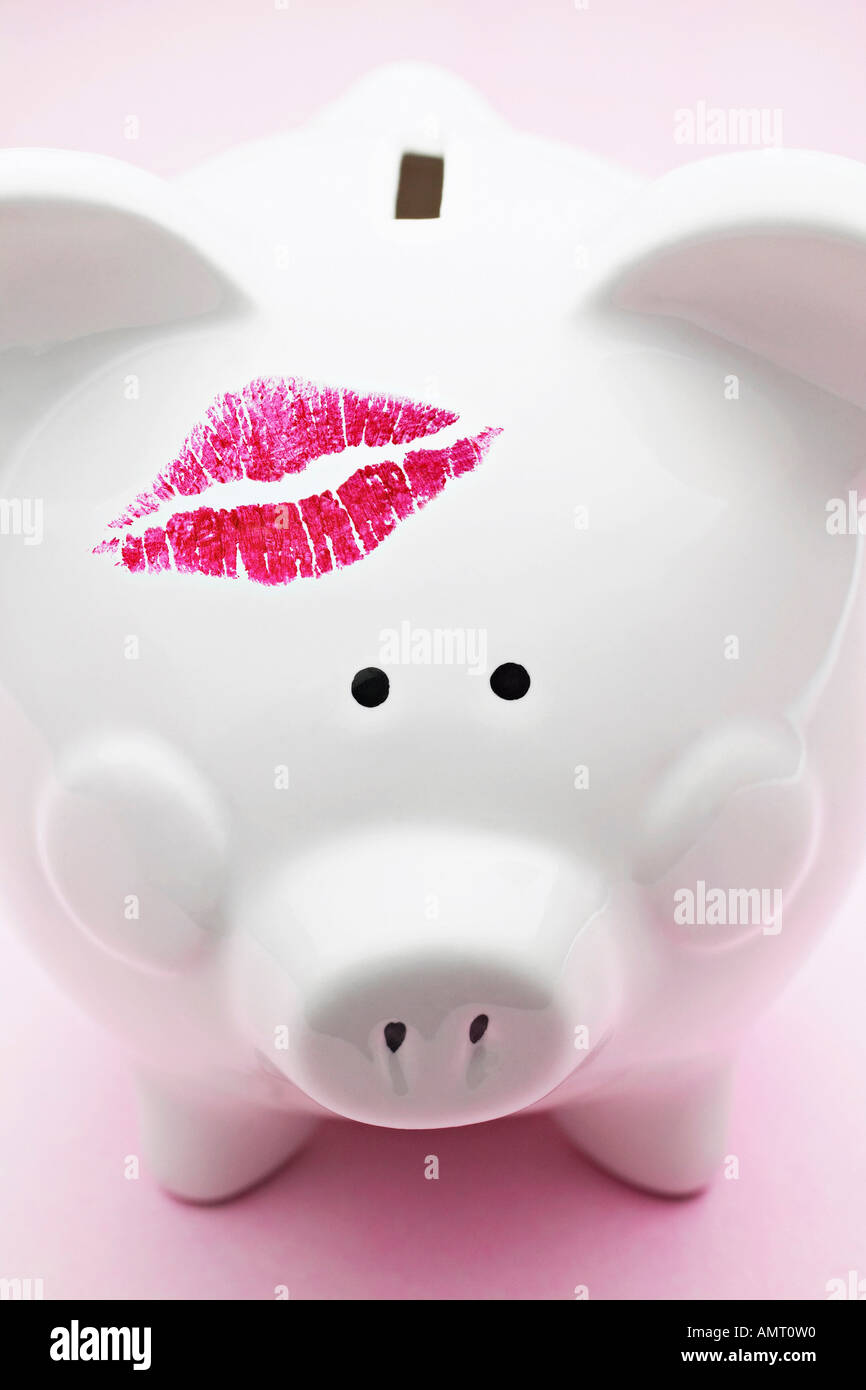 Piggy Bank With Lipstick Mark Stock Photo - Alamy