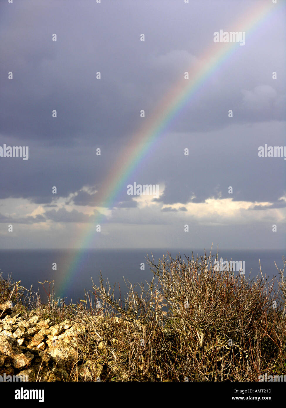 Rainbow over the sea Stock Photo - Alamy