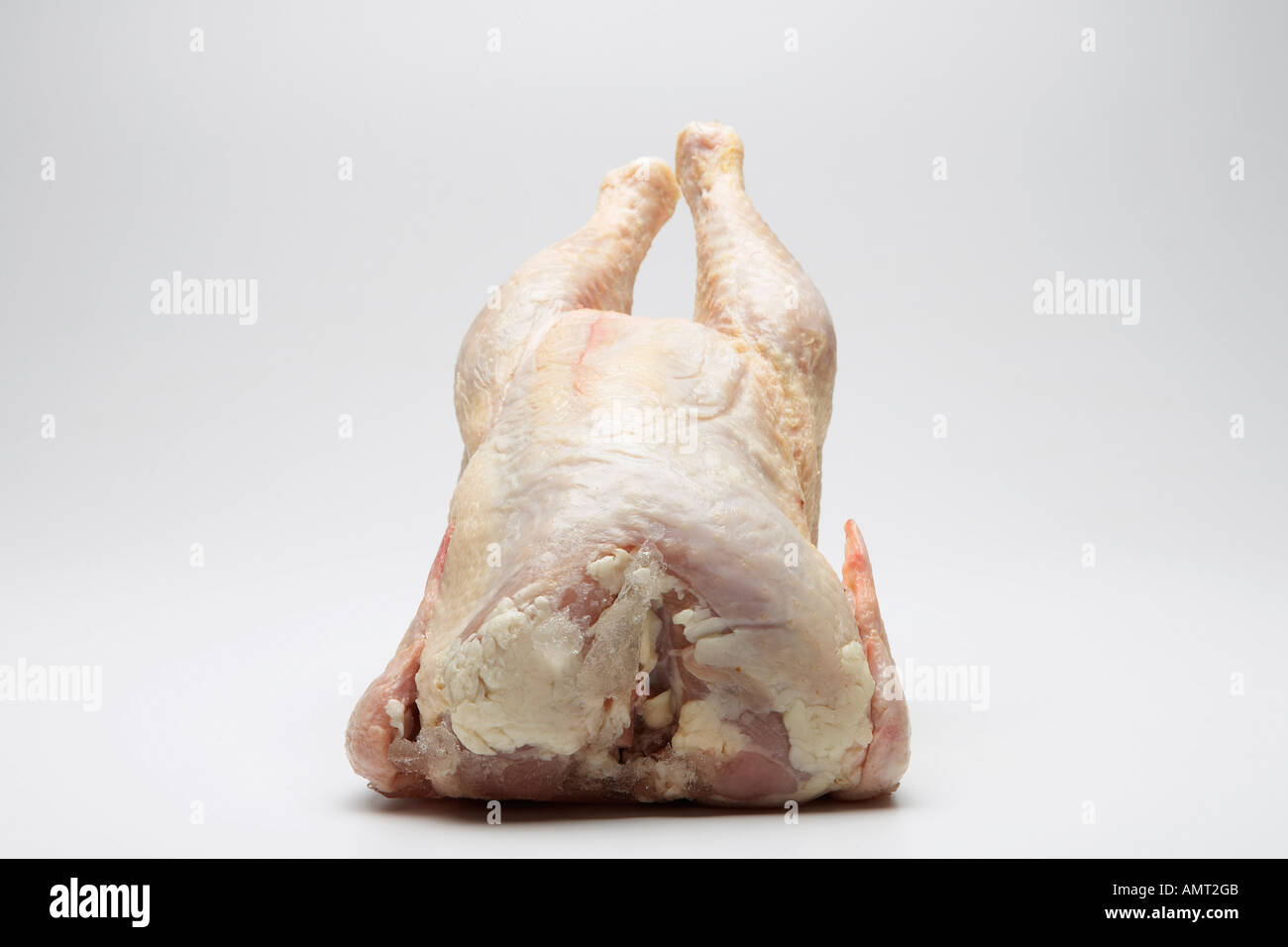 Whole chicken with head and feet hi-res stock photography and images ...