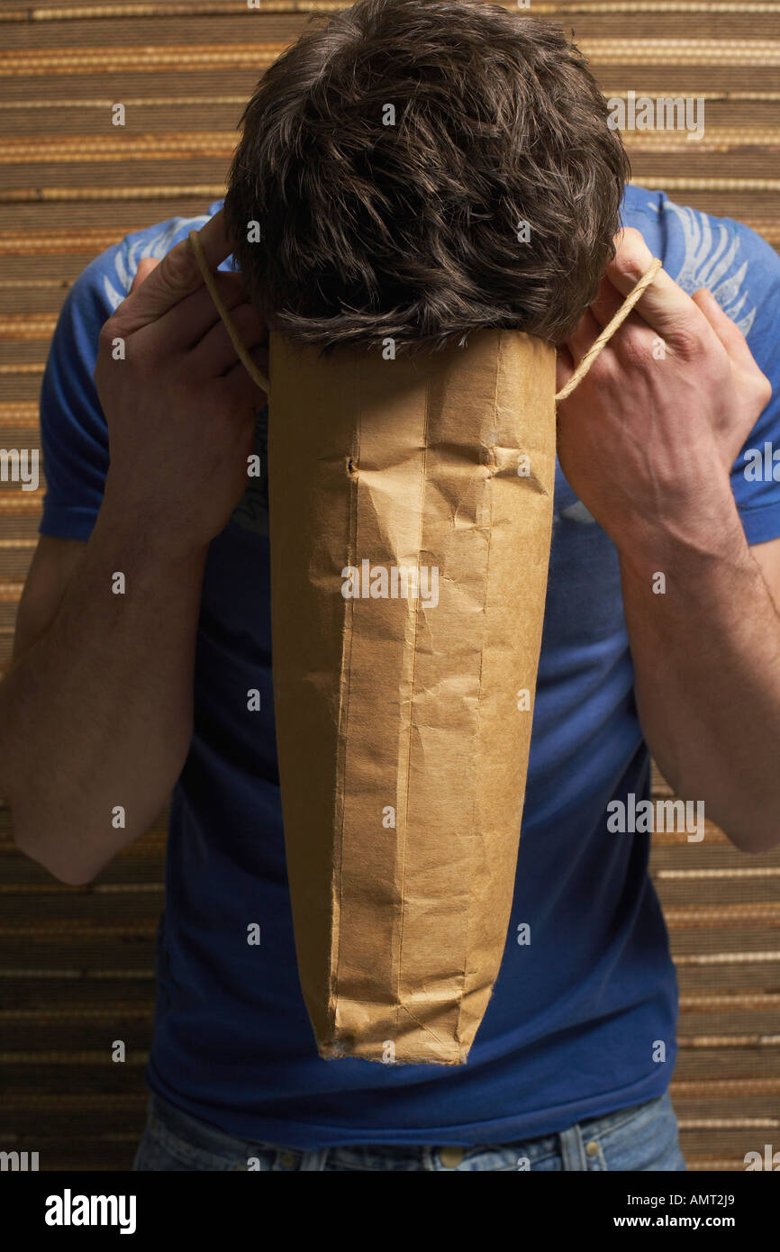 Man vomiting in bag hi-res stock photography and images - Alamy