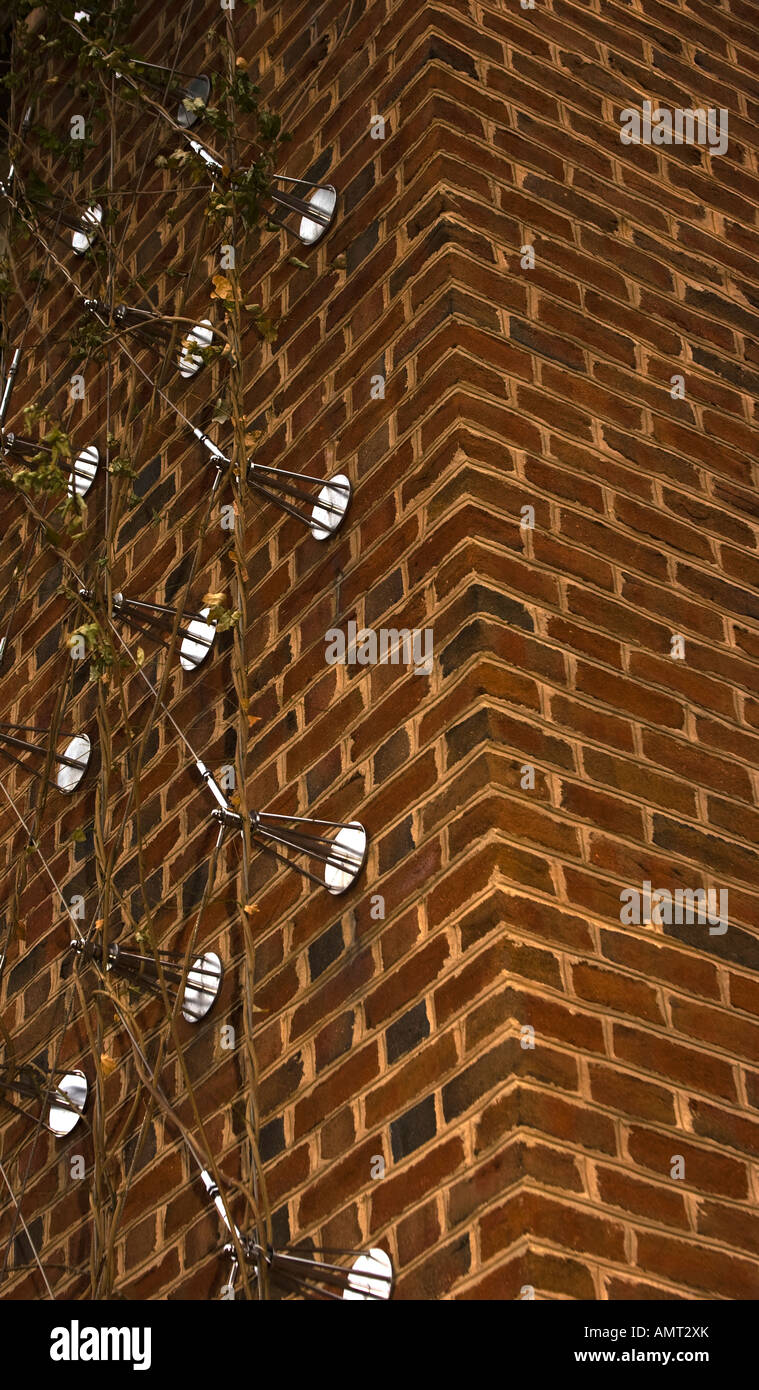 stainless steel cable design on brick Stock Photo - Alamy