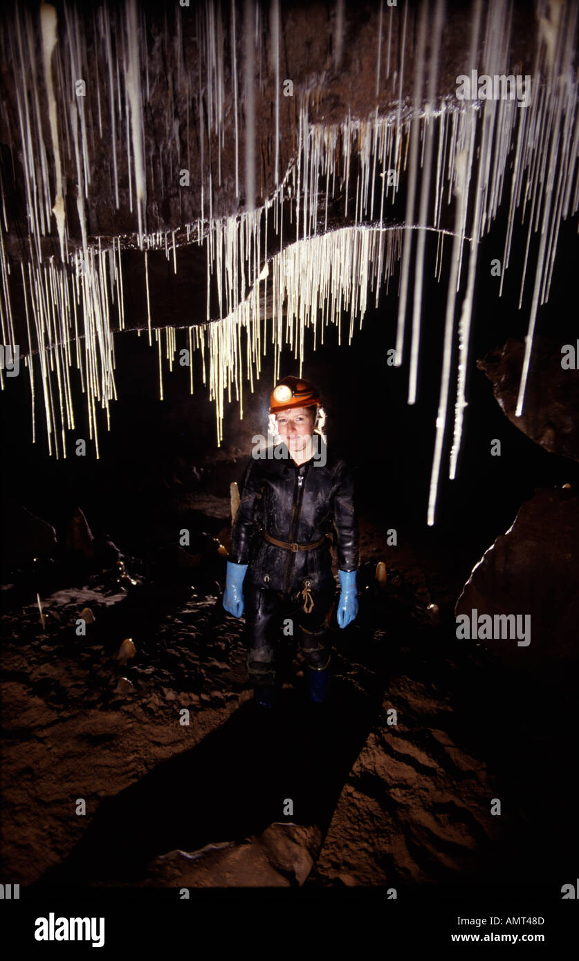 A female caver in Cloud Chamber Dan yr Ogof Brecon Beacons South Wales ...
