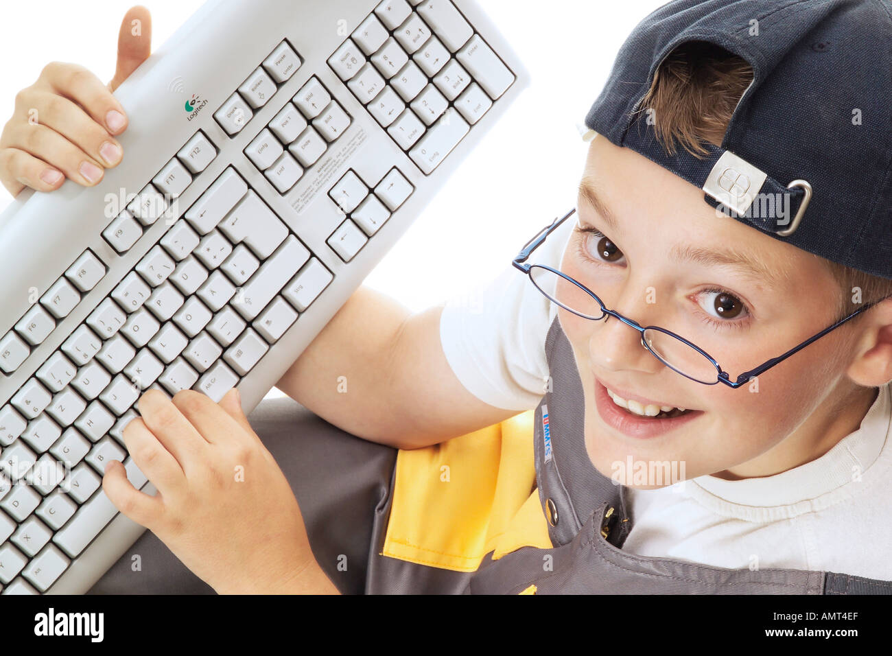 Boy using keyboard Stock Photo - Alamy