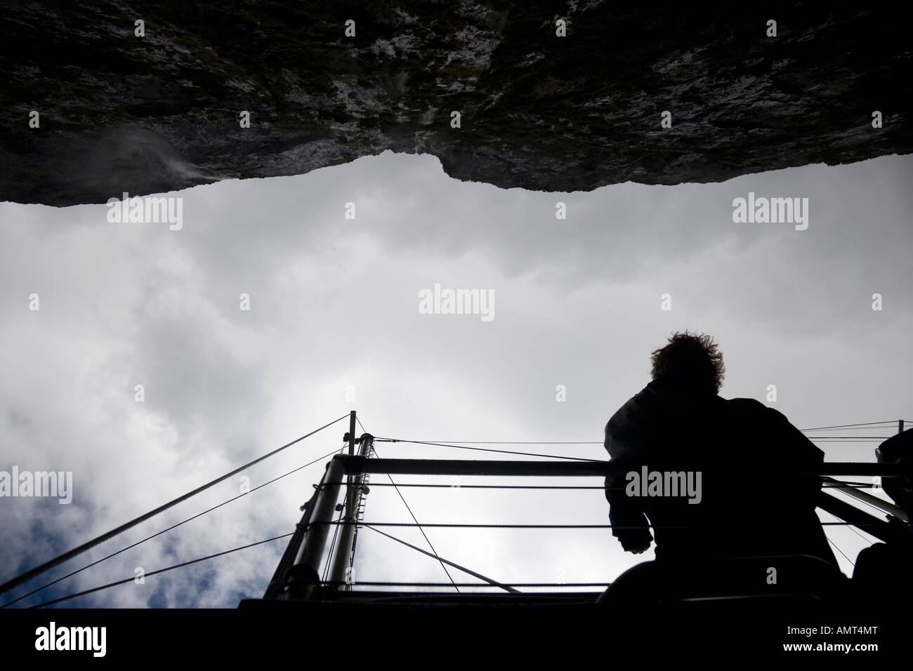 Looking up the side of a cliff, Milford Sound, New Zealand Stock Photo ...