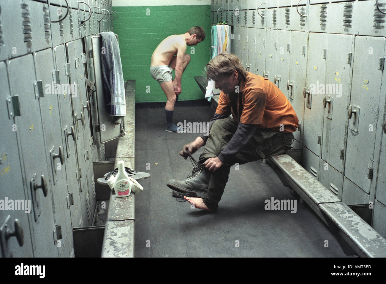Miners change in the locker room after finishing their shift at Tower ...
