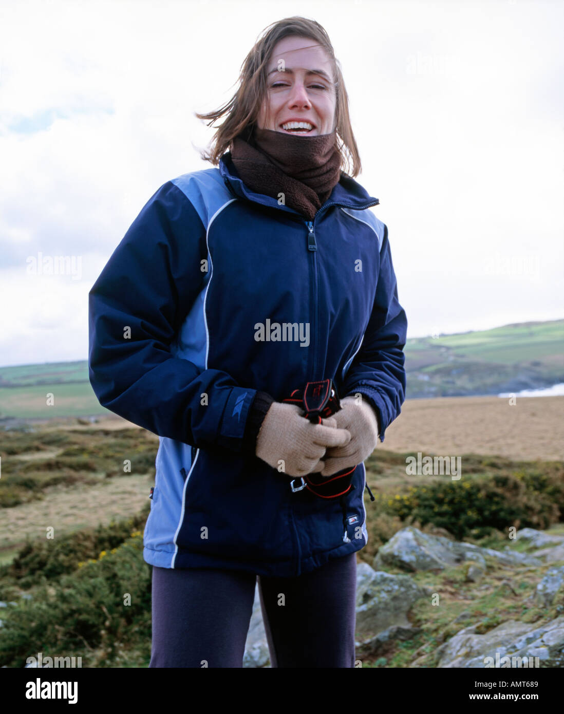 Young woman outside laughing Stock Photo - Alamy