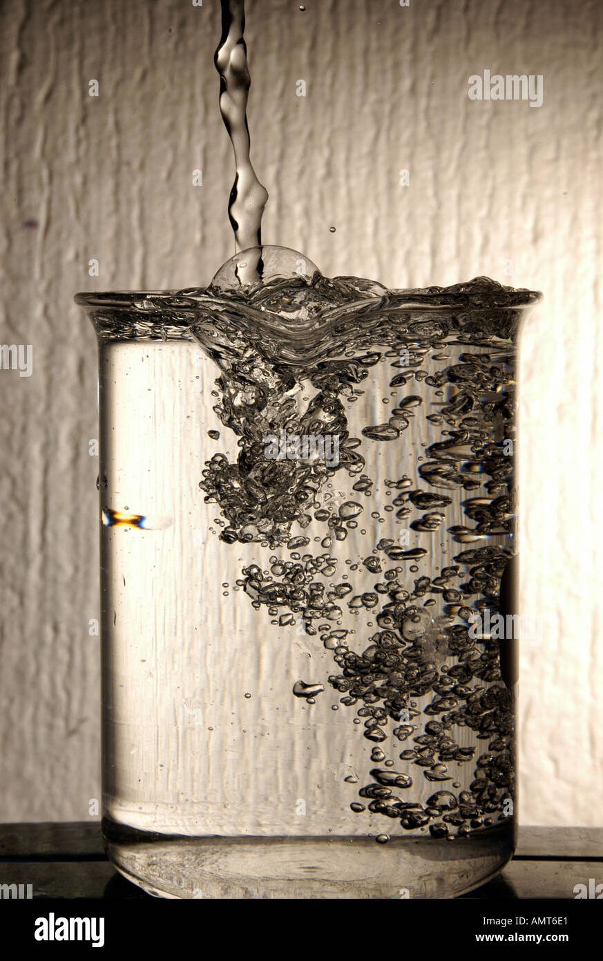 Water glass full overflow hi-res stock photography and images - Alamy