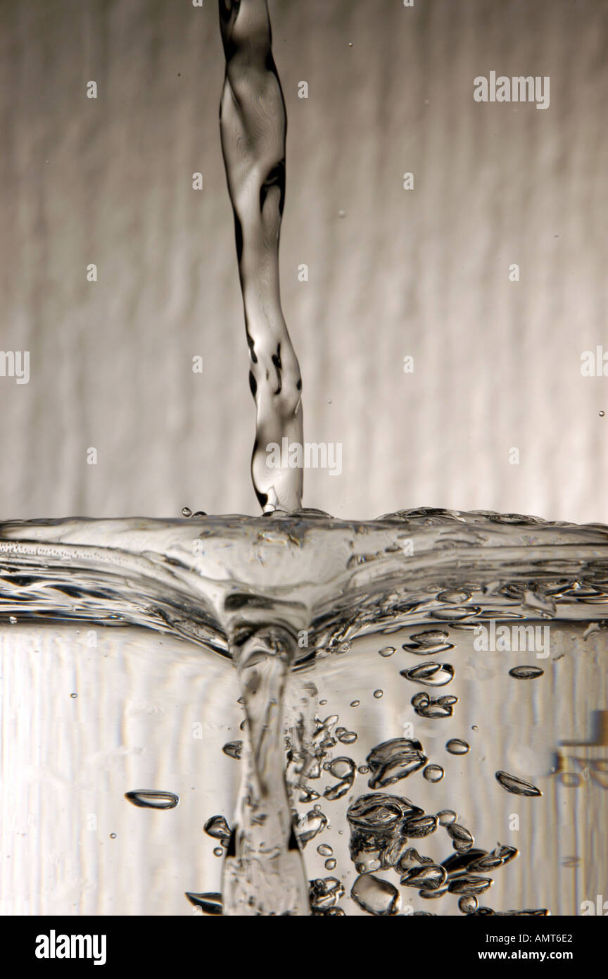 Pouring water Stock Photo - Alamy