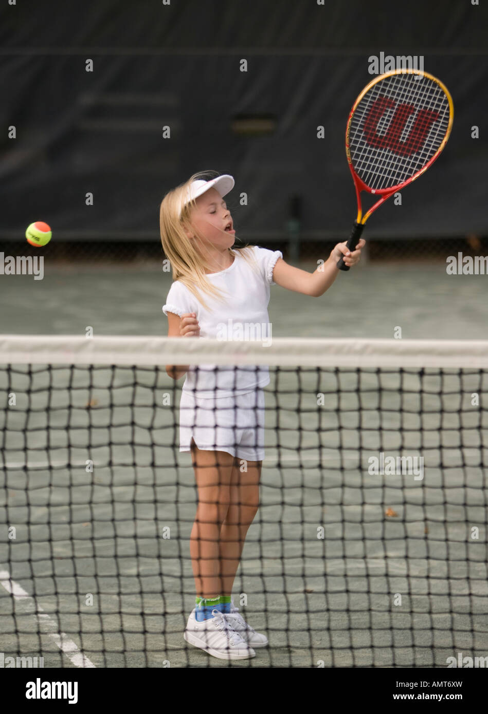 Child playing tennis Stock Photo - Alamy