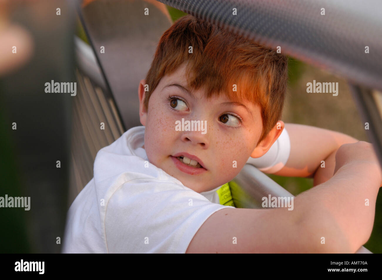 Red haired boy looking back Stock Photo - Alamy