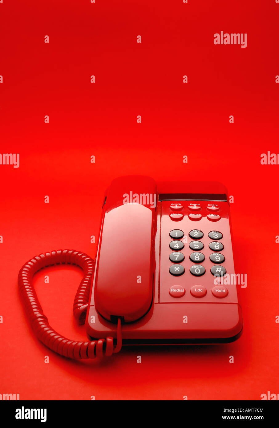Red on red phone Stock Photo - Alamy
