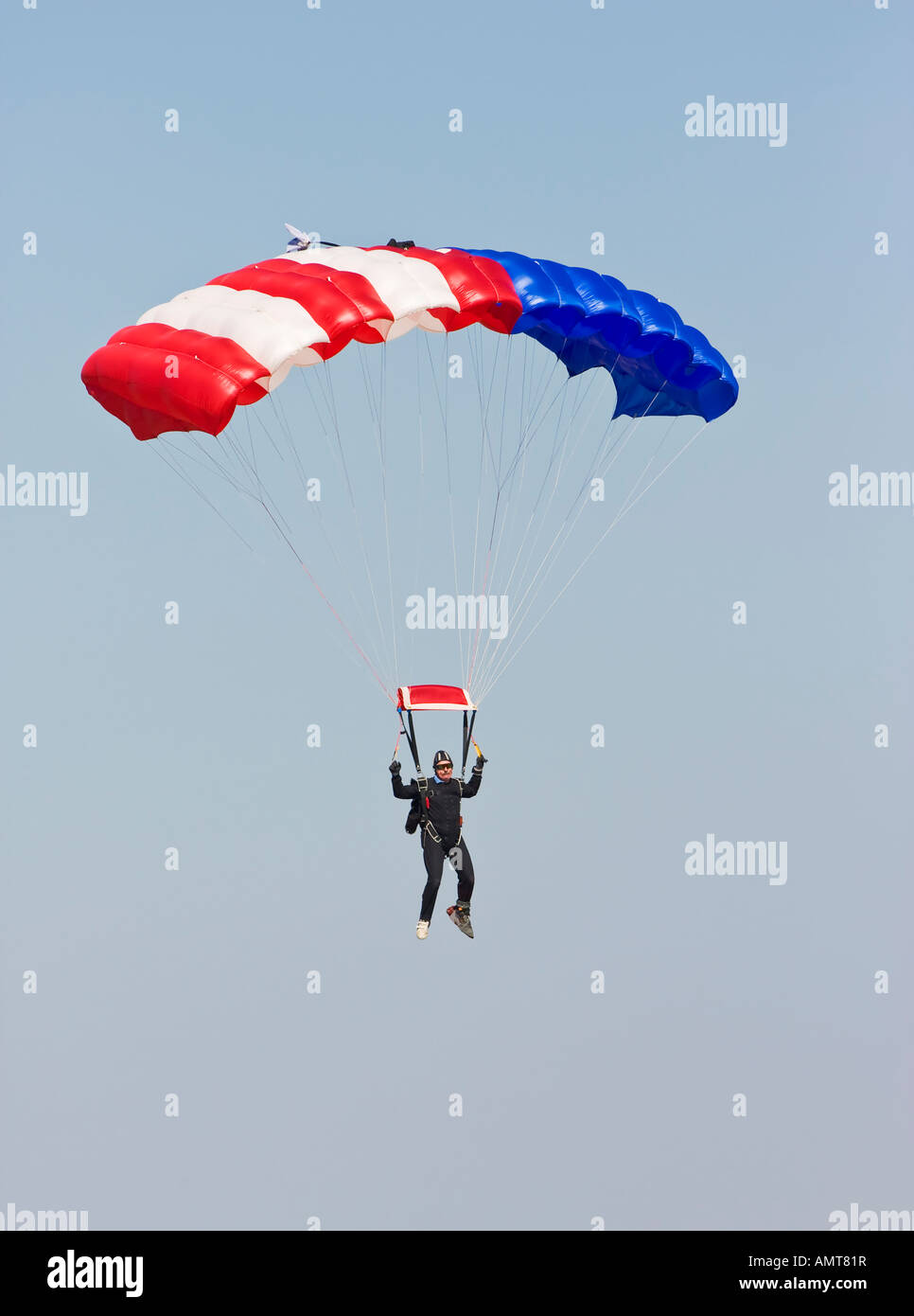 Skydiver with American flag parachute Stock Photo - Alamy