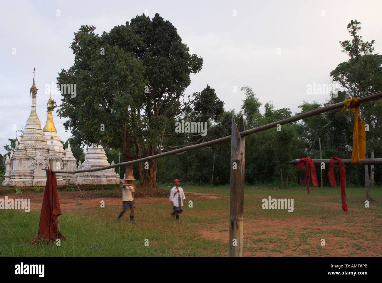 Myanmar Burma Shan State village of Thit La two villagers walking by ...