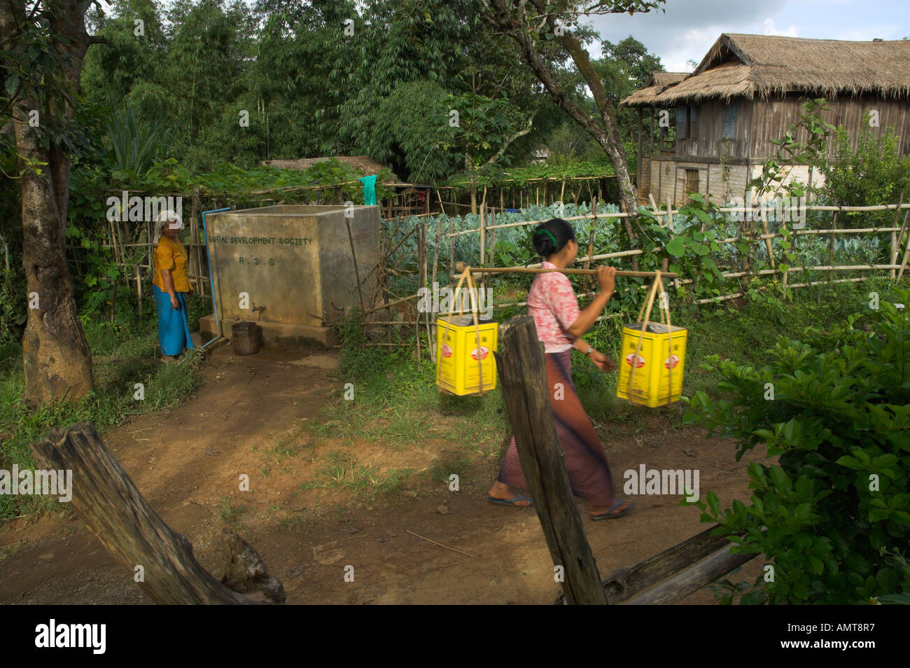 Fetching water buckets hi-res stock photography and images - Alamy