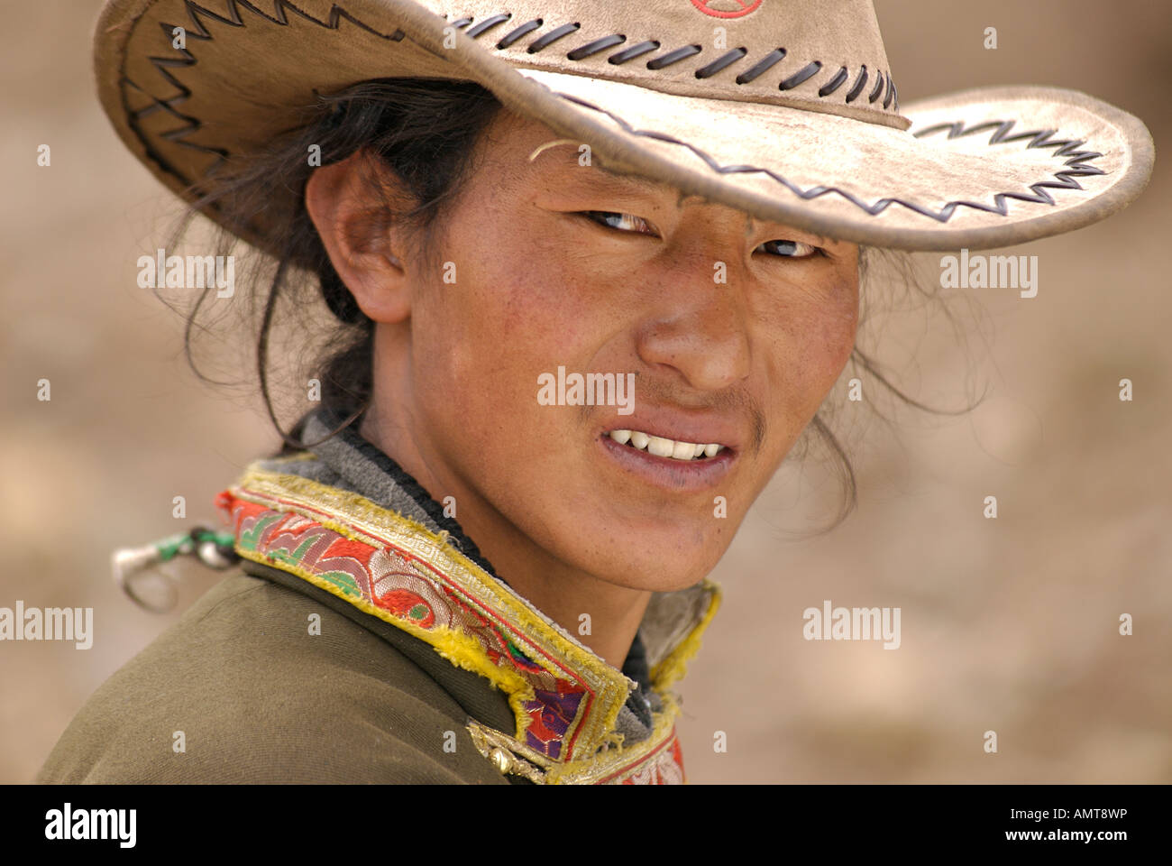 Tibetan man in cowboy hat hi-res stock photography and images - Alamy