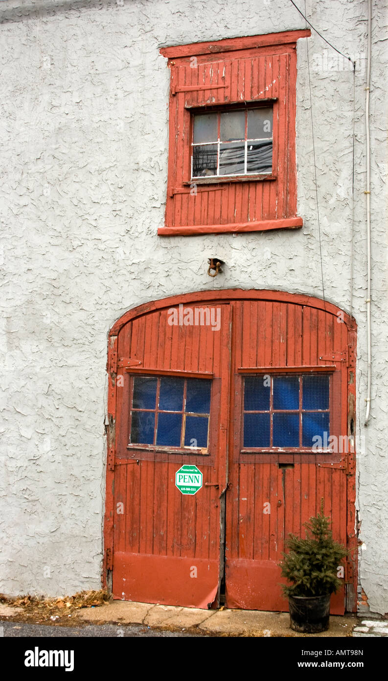 old rear carriage house doors & window Stock Photo - Alamy