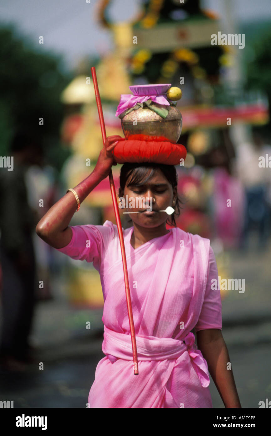 Mauritius, Cavadee Festival, A woman devotee carrying a sambo of milk ...