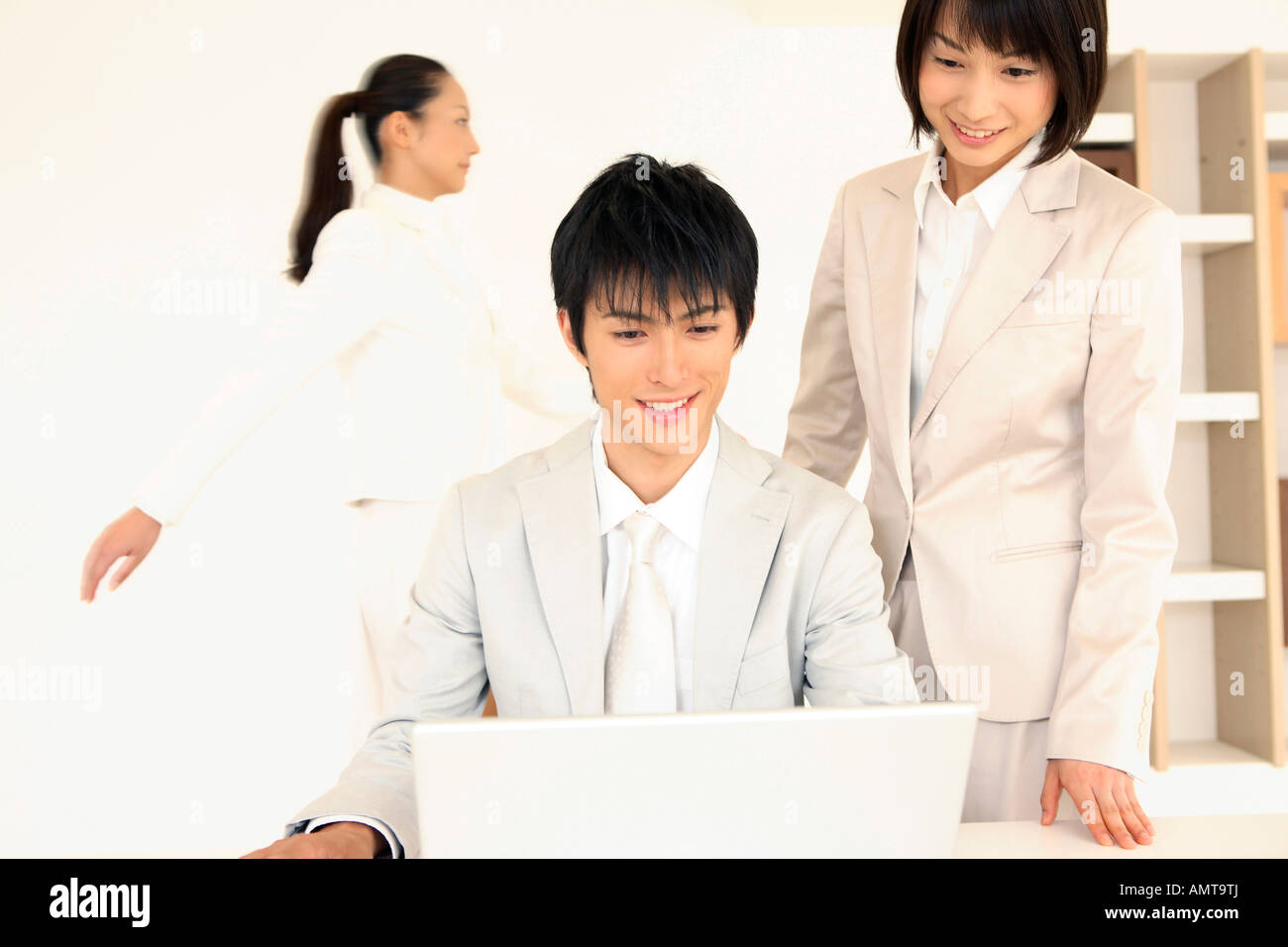 Office worker operating a PC Stock Photo - Alamy