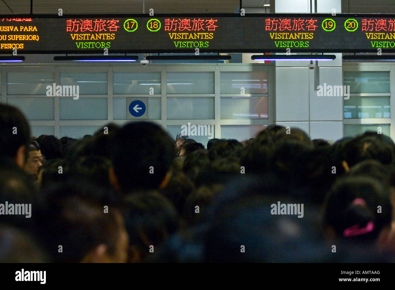 Chinese People Wait to Enter Macau at the Border Crossing Between Macau ...