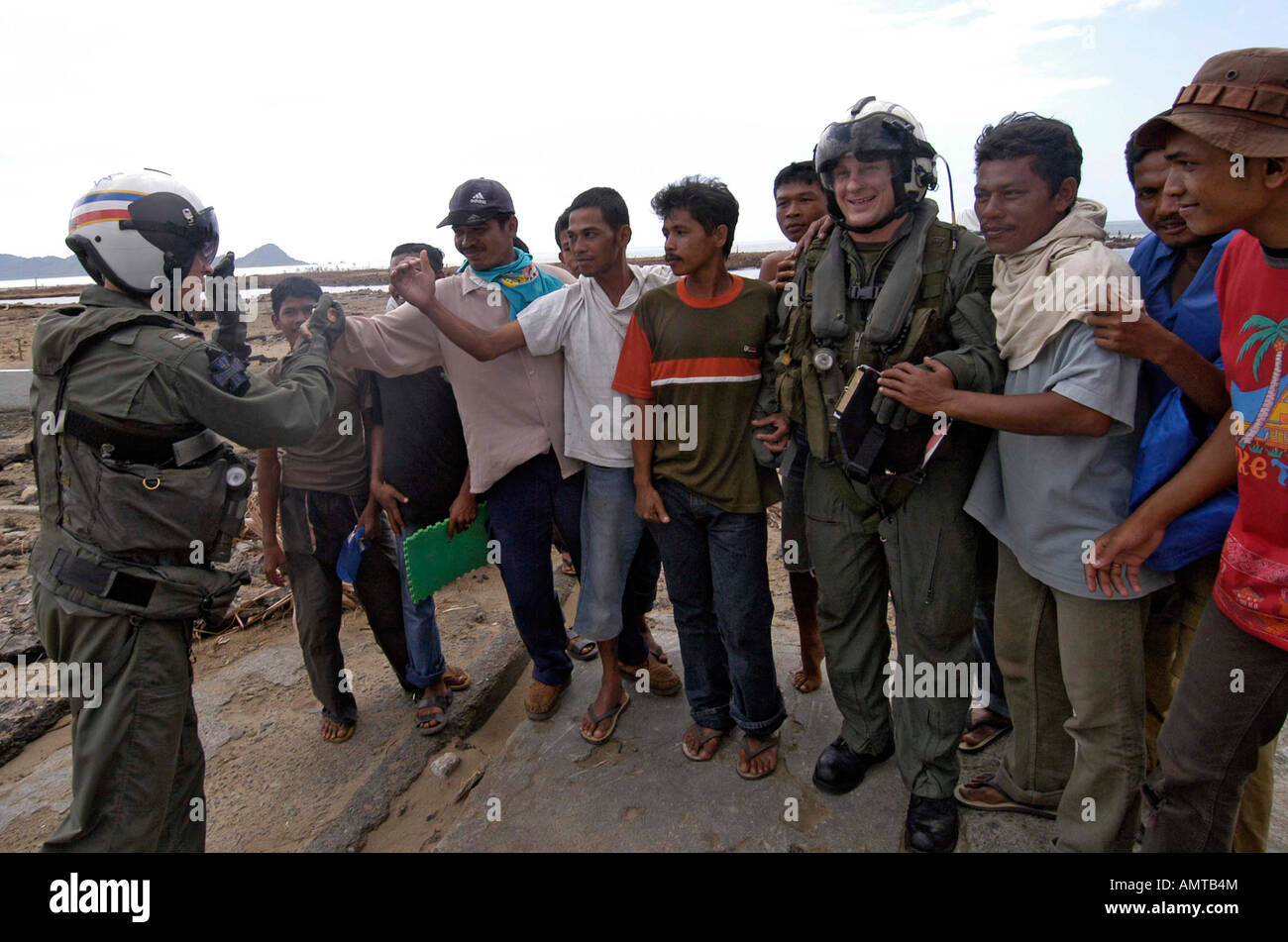 US Navy Capt Matt Klunder left and Petty Officer 2nd class Donal ...