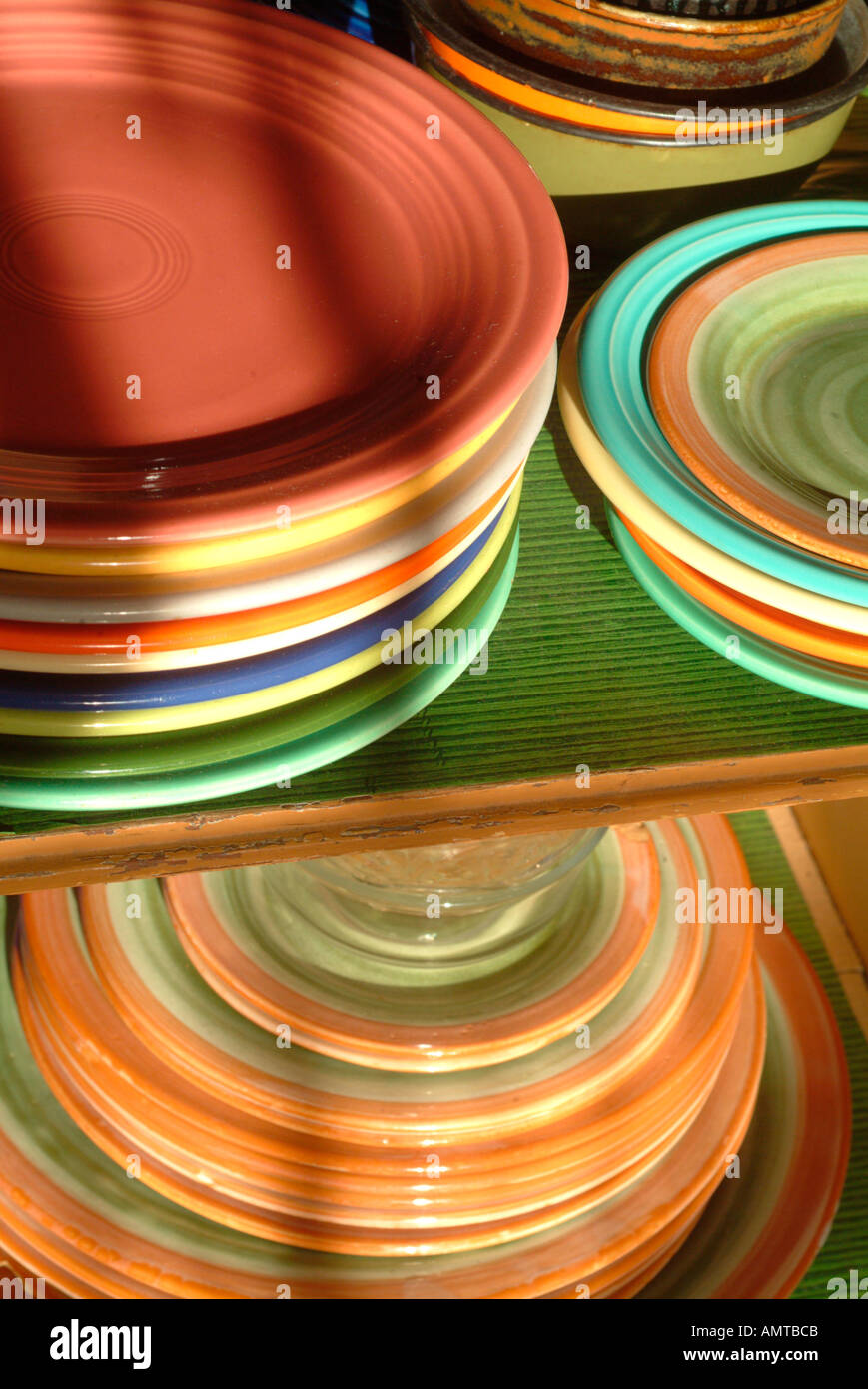rustic plates in a cupboard Stock Photo - Alamy