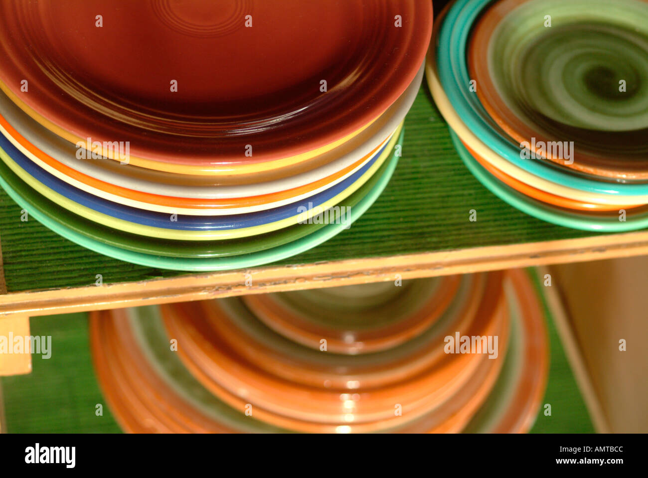 rustic plates in a cupboard Stock Photo - Alamy